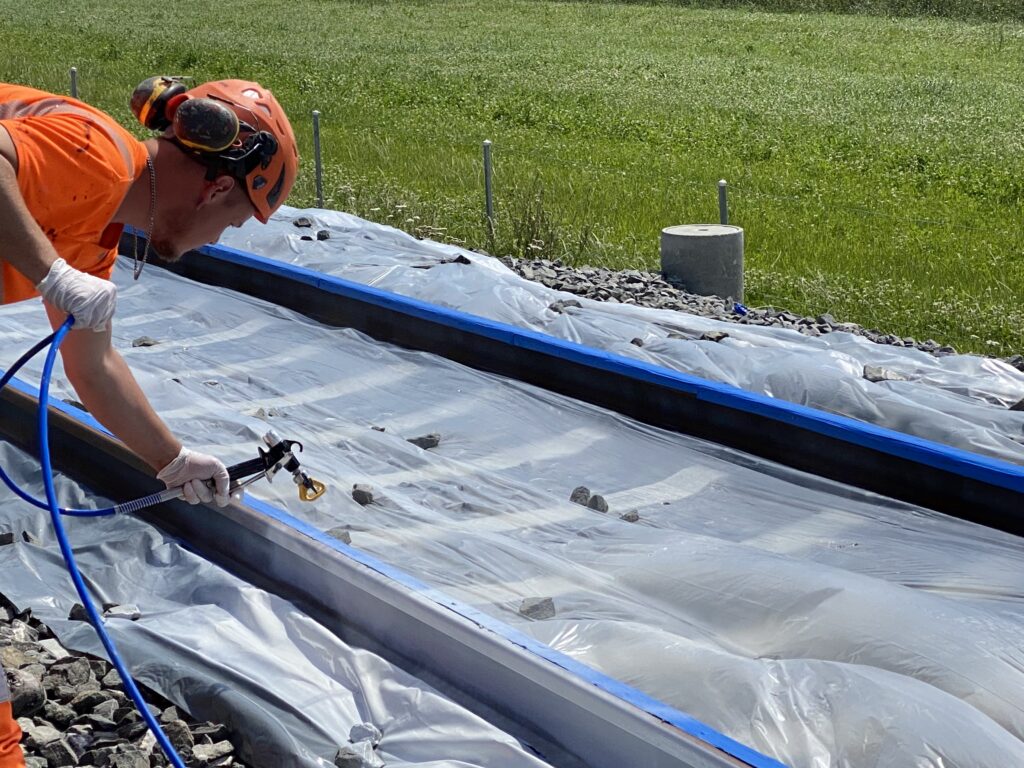 The Coolest White für die Fahrbahnerneuerung der SBB | Monopol Colors